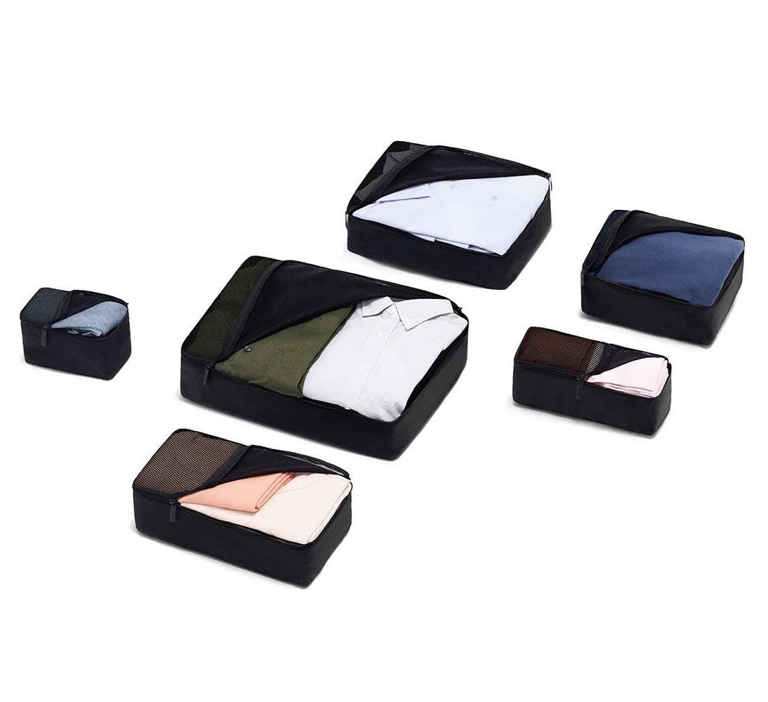 19 Wardrobe Basics That Are Always in Our Suitcases | Who What Wear