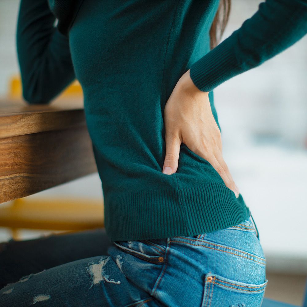 7 Ways to Alleviate Back Pain During Periods | Who What Wear