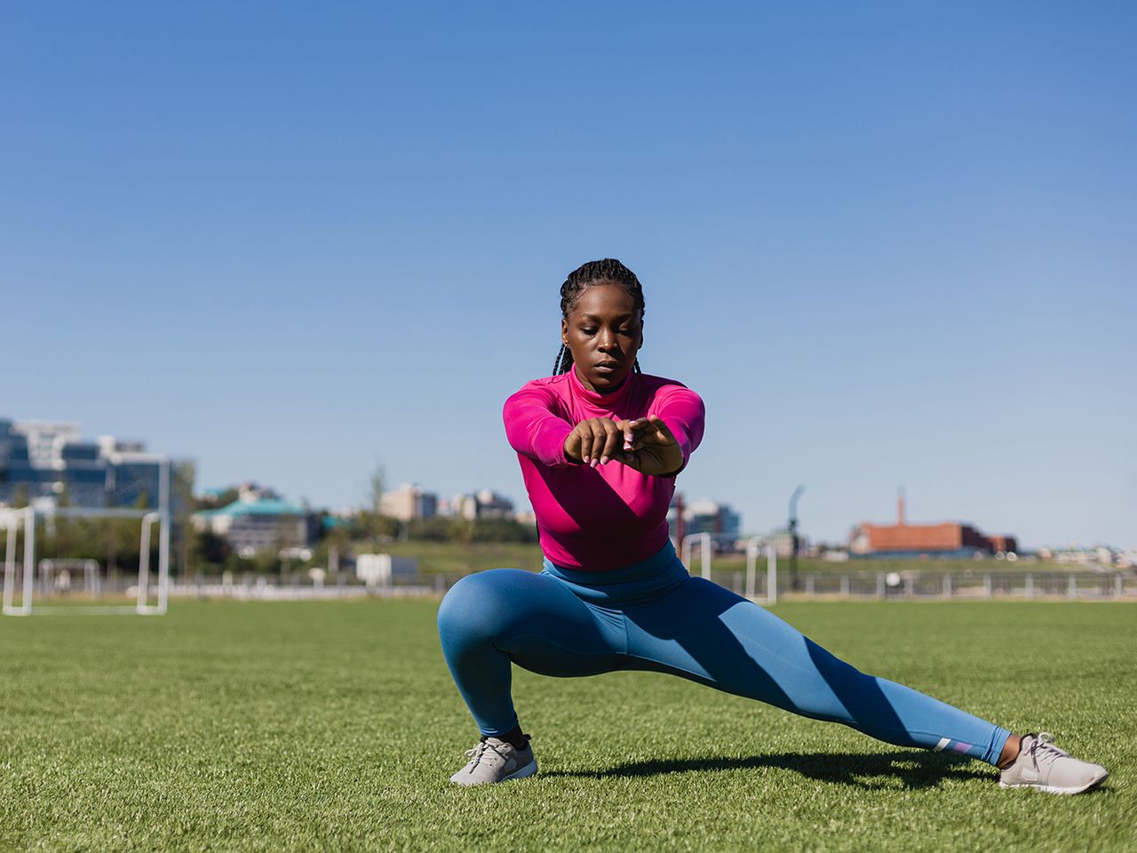 13 Easy Stretches to Do Before a Workout | Who What Wear