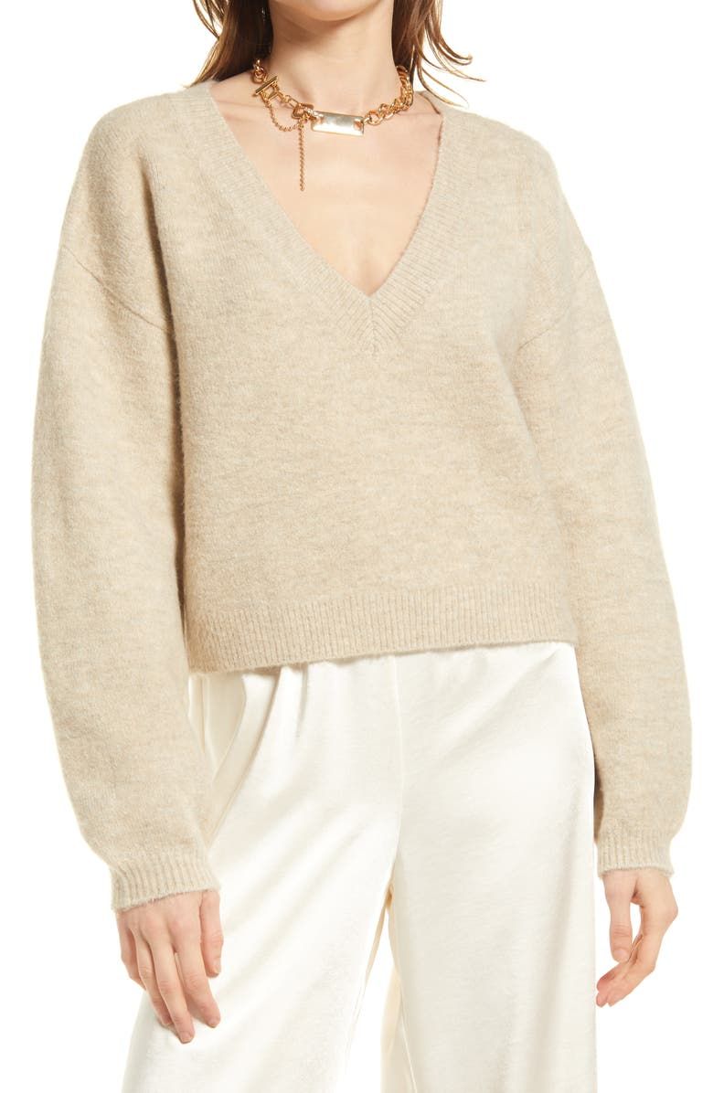 11 Trendy Sweater Outfits You'll See Everyone in This Winter | Who What ...