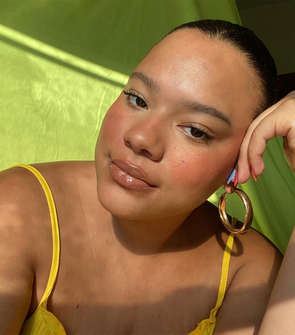 The 15 Best Sunscreen Mists You Can Wear Over Makeup | Who What Wear