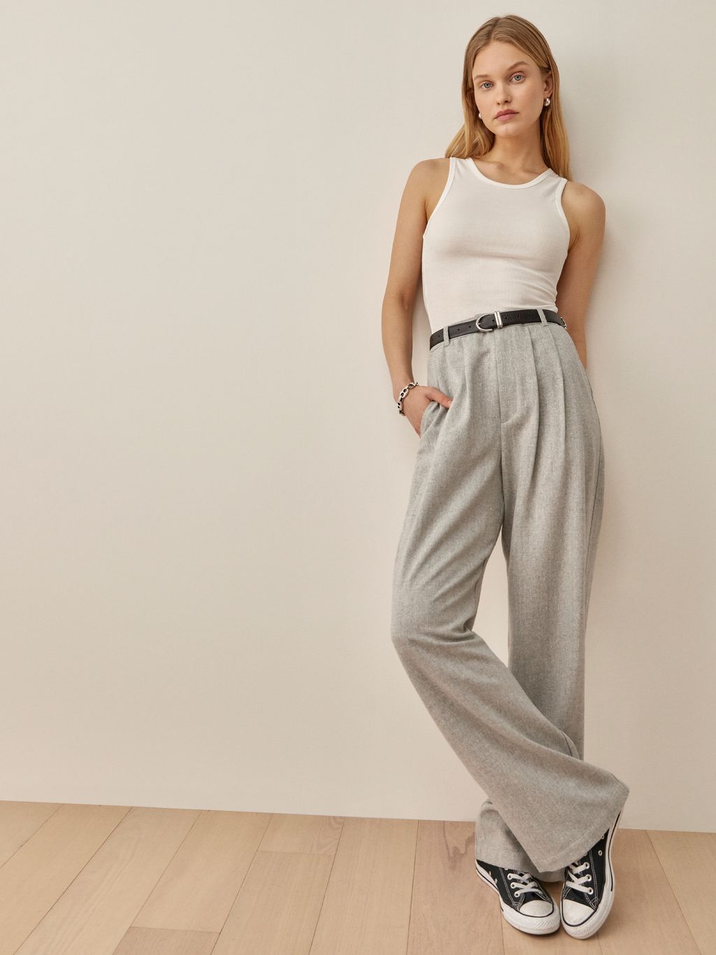 8 Items Parisians Love to Wear With Spring's Big Pant Trend | Who What Wear