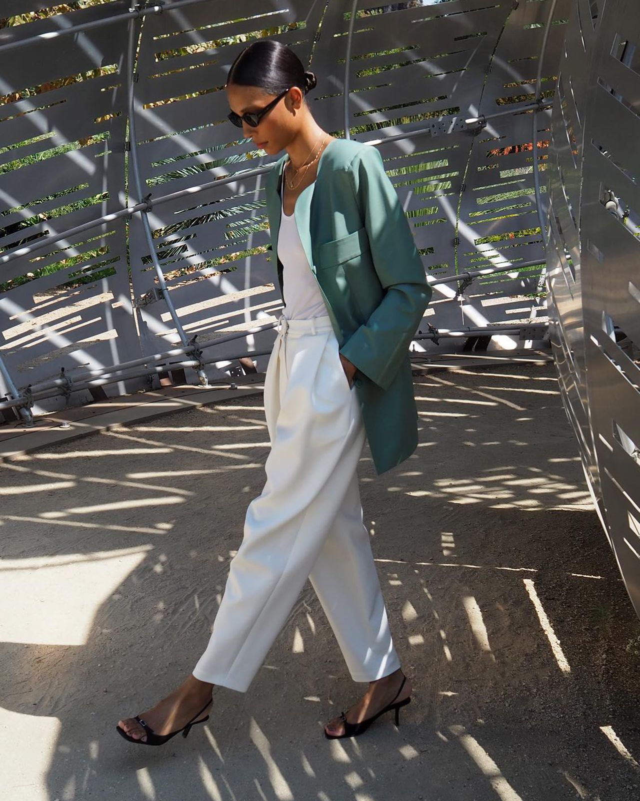 The Middle-Part-Bun Hairstyle Is Trending For Summer 2023 | Who What ...