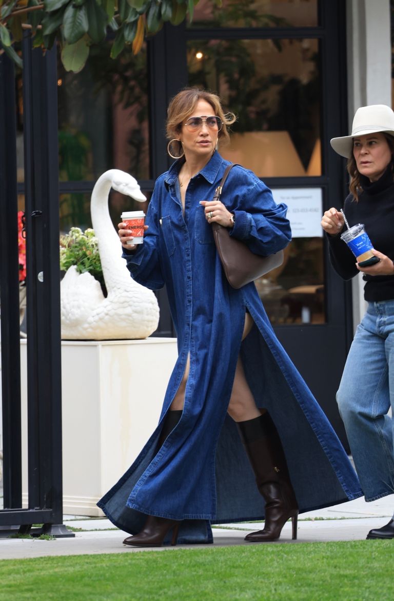 Jennifer Lopez Wore a Risqué Maxi Dress With Knee-High Boots | Who What ...