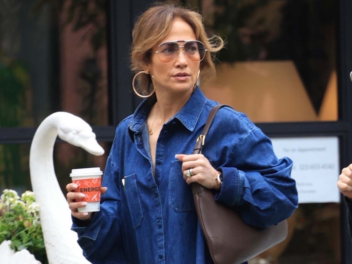 Jennifer Lopez Wore a Risqué Maxi Dress With Knee-High Boots | Who What ...