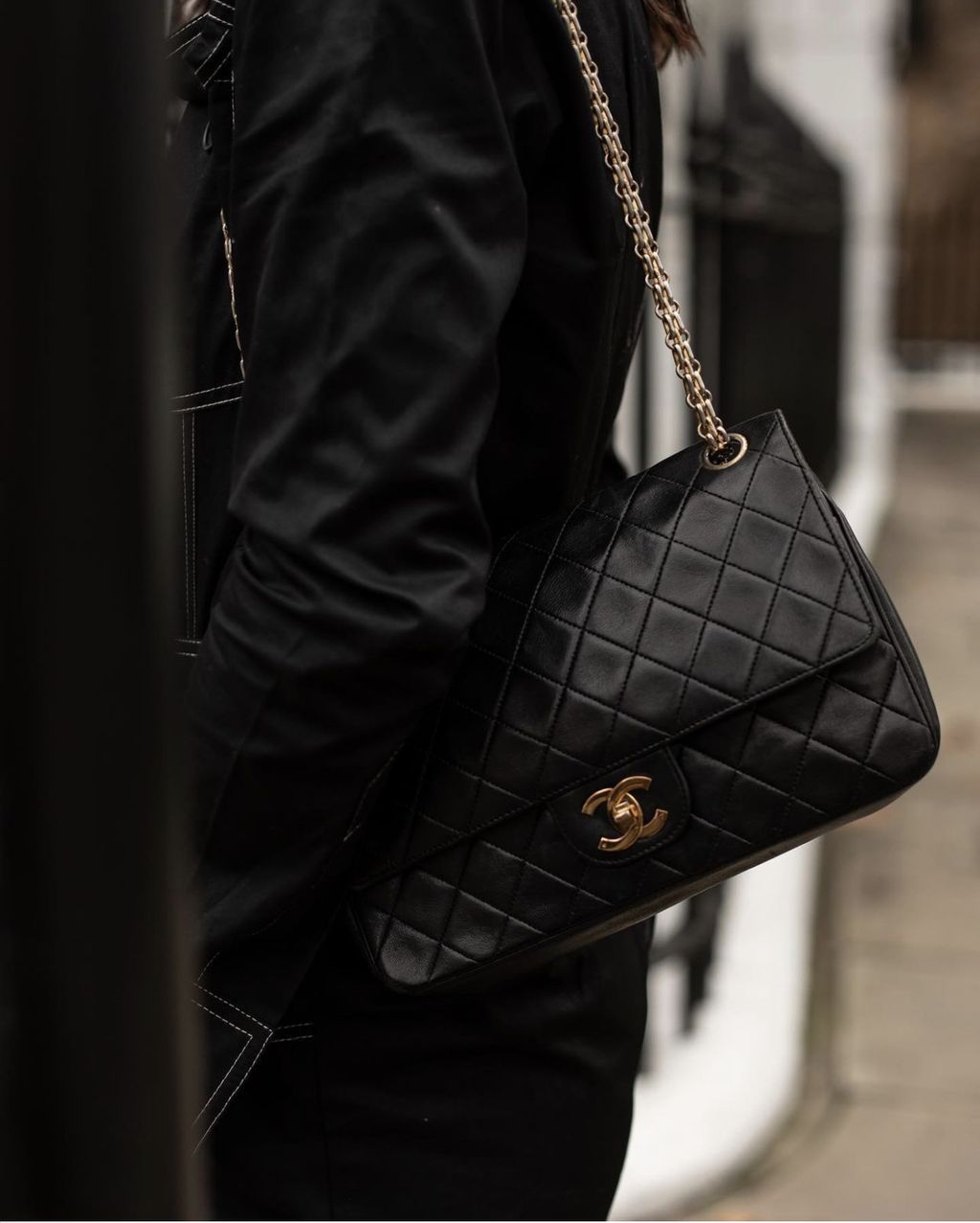Chanel Classic Flap Bag: History, Legacy and Price in 2025 | Who What Wear