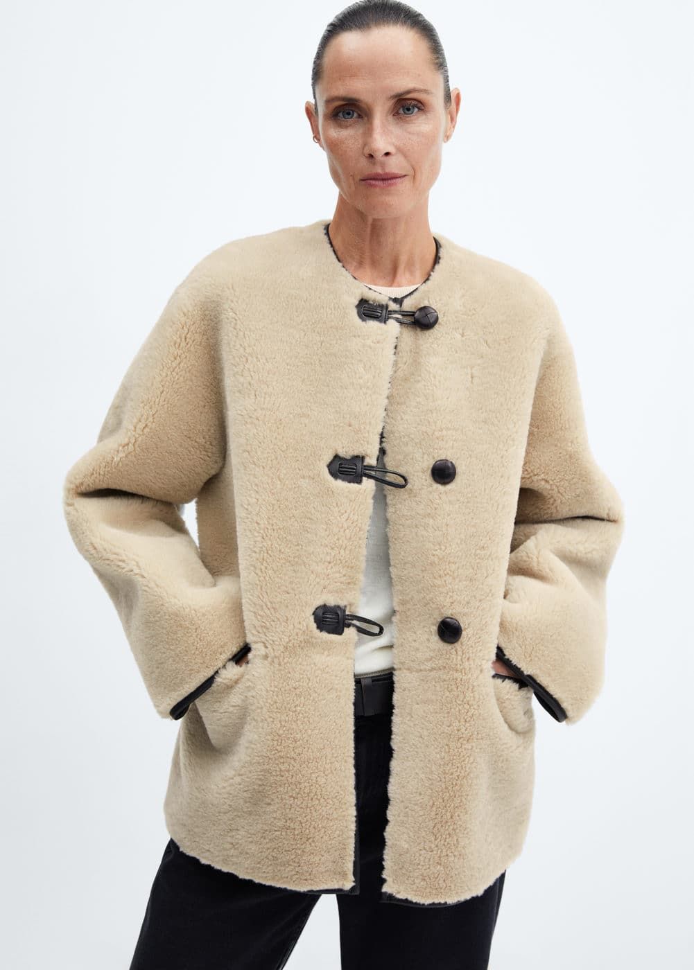 FYI: The TikTok-Viral Mango Shearling Coat Is Back in Stock | Who What Wear