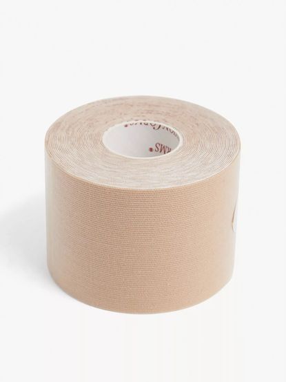 How to Use Boob Tape to Make Your Outfits Look Polished | Who What Wear