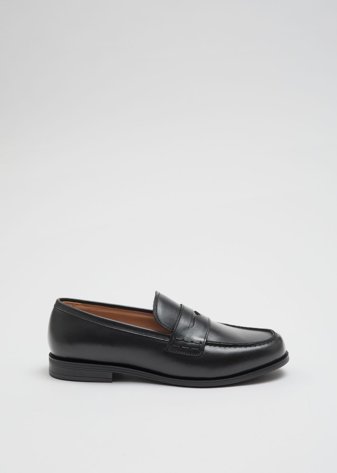 The Penny Loafer Is Back for 2024—Ready Your Jeans | Who What Wear
