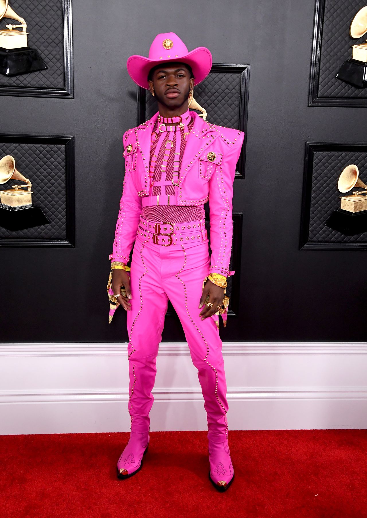 The 14 Most Iconic Versace Looks in Grammys History | Who What Wear