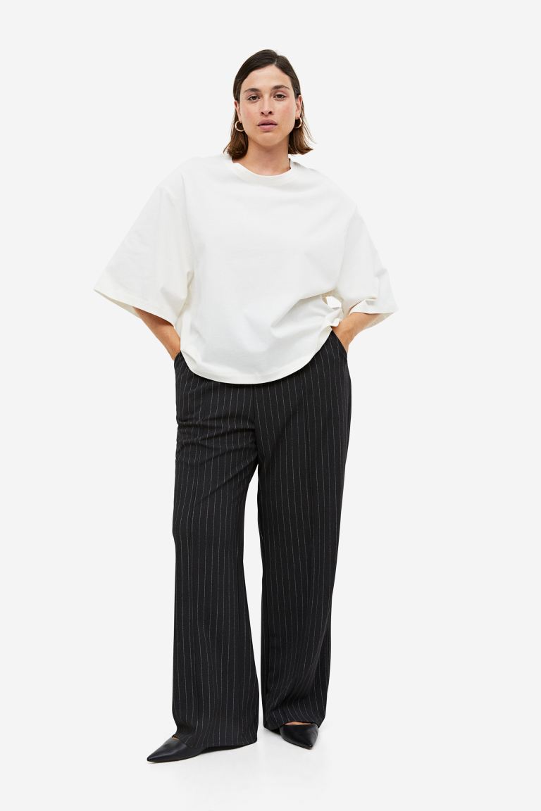 The Pinstripe Trouser Trend Is Back for 2024—It's So Classy | Who What Wear