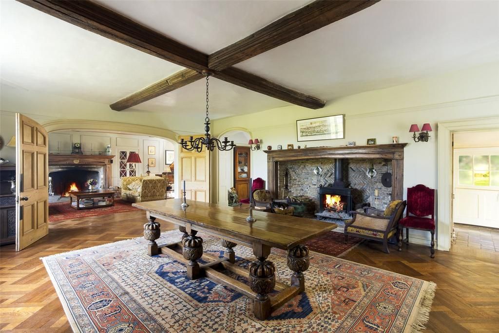 The Kent manor with an original Tudor fireplace and space for a string ...