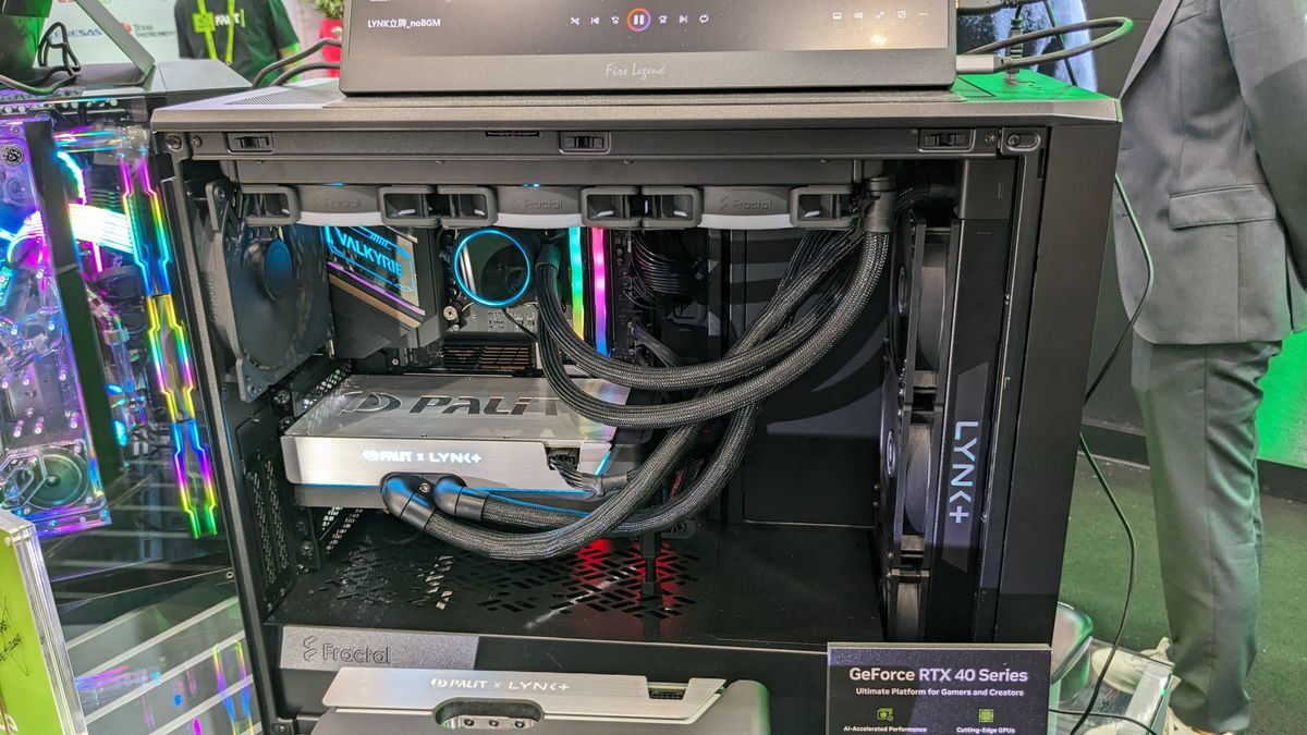 This overpowered RTX 4090 card has a built-in water block, a screen and ...
