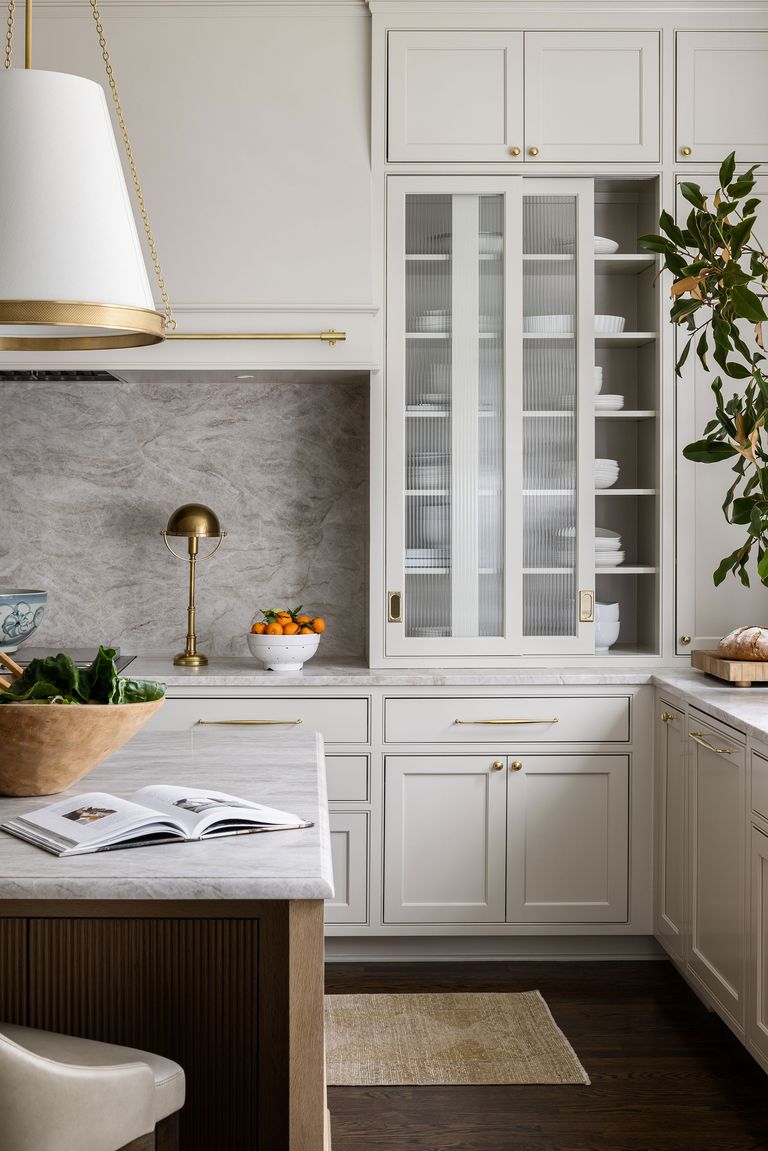 10 Glass Kitchen Cabinet Ideas to Make a Space Feel Bigger | Livingetc