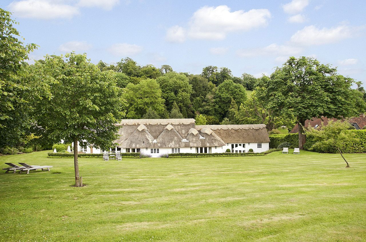 A delightful period thatched cottage that has been exquisitely ...