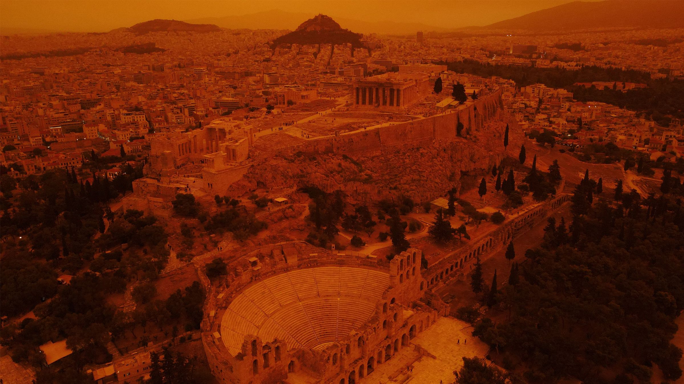 Eerie, orange skies loom over Athens as dust storm engulfs southern ...