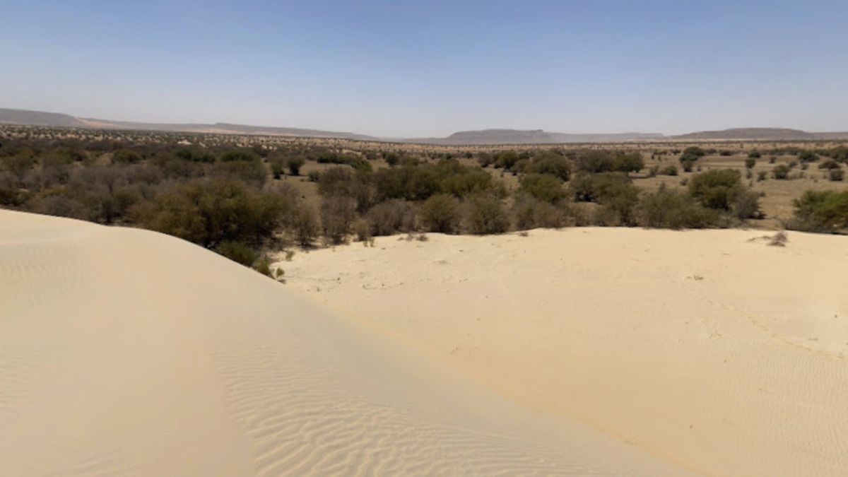 Trio of 'black mesas' leftover from Paleozoic era spawn rare sand dunes ...