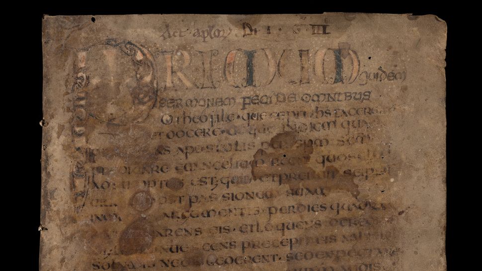 Woman's name and tiny sketches hidden in 1,200-year-old manuscript ...