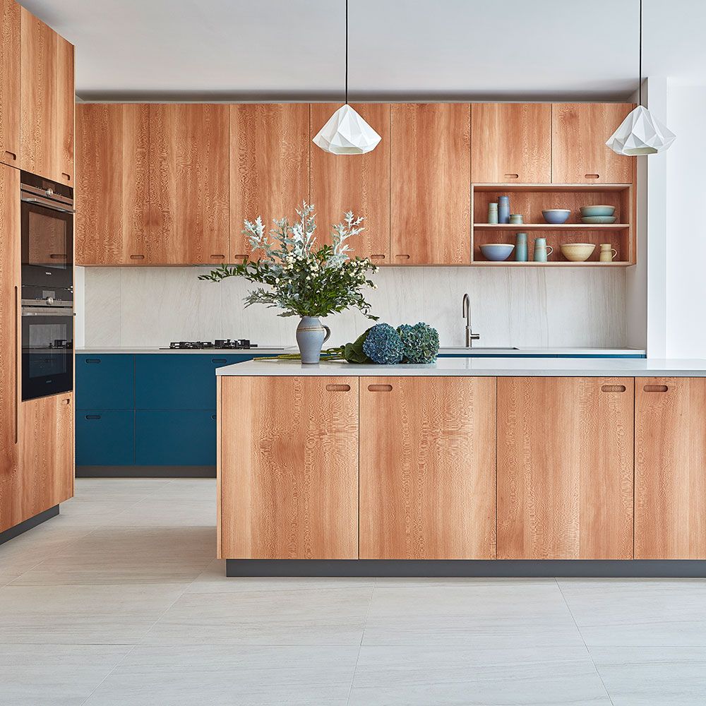 Retro plywood kitchen makeover with blue doors and Corian worktops ...