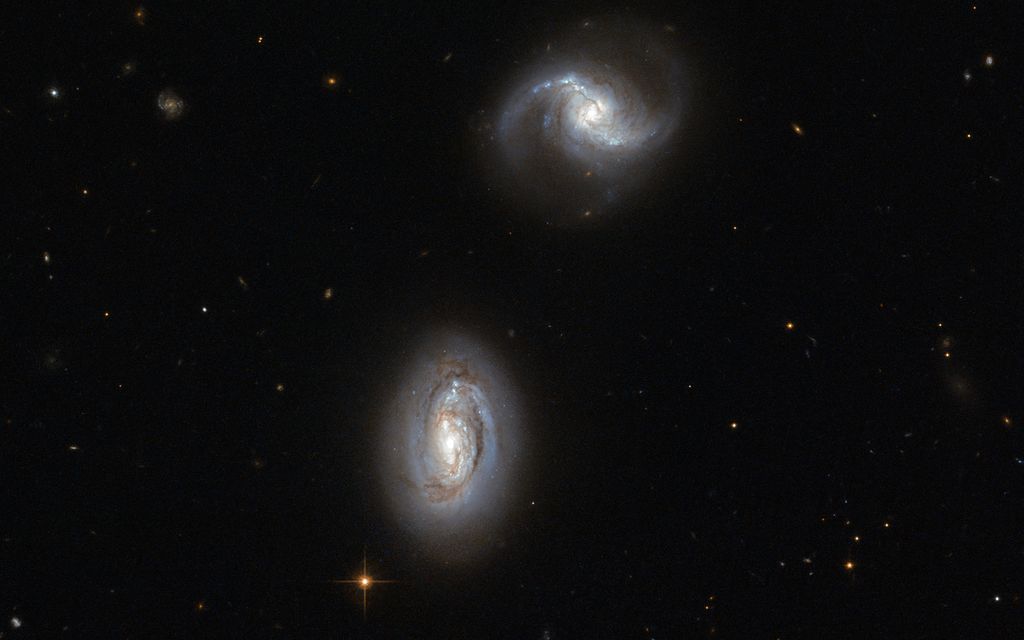 Bosom Buddies: A Galactic Pair Wallpaper | Space