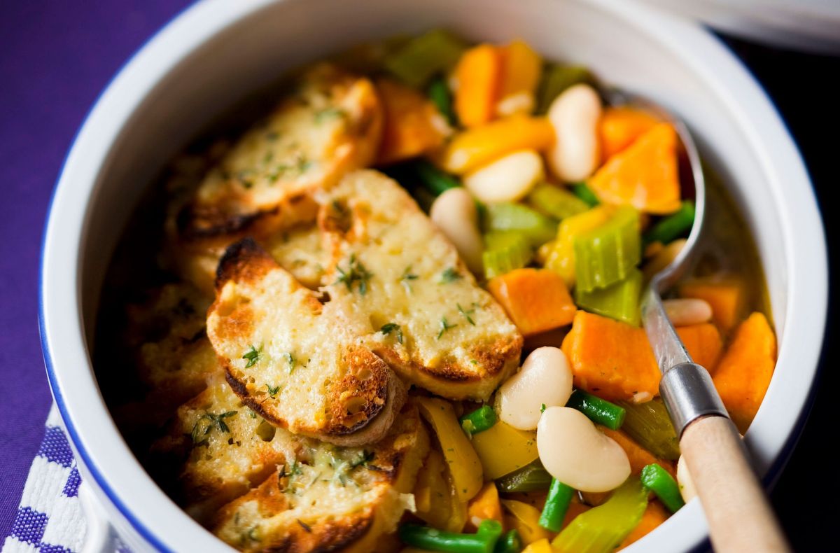 Bean hotpot with cheesy croutons | British Recipes | GoodtoKnow