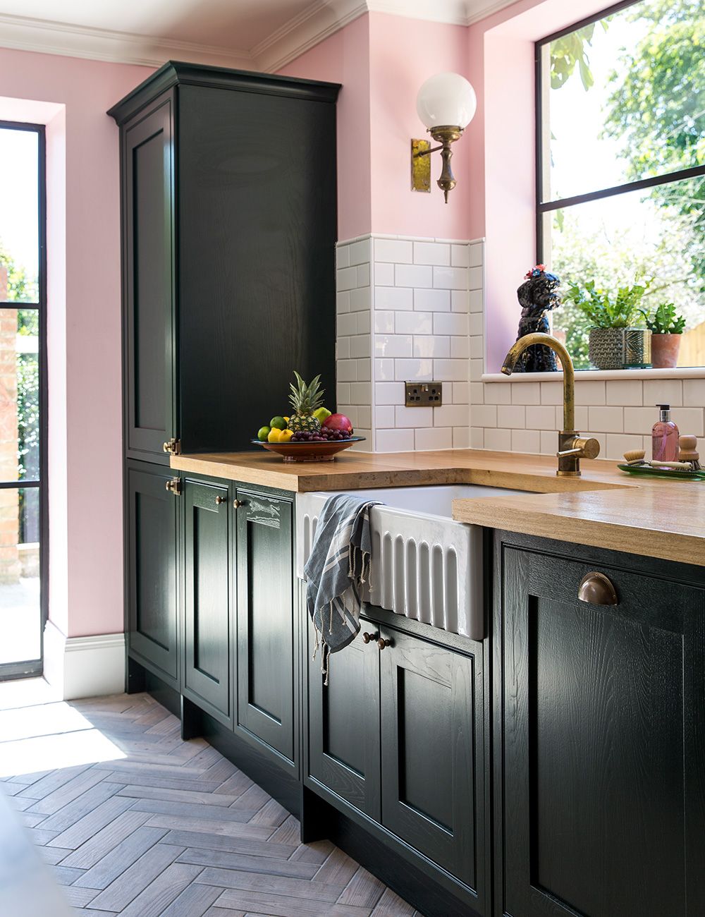 Basement kitchen makeover with emerald green units, marble worktops and ...