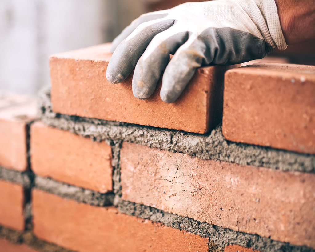 How to build a garden wall: tips for timber, brick, and more | Gardeningetc