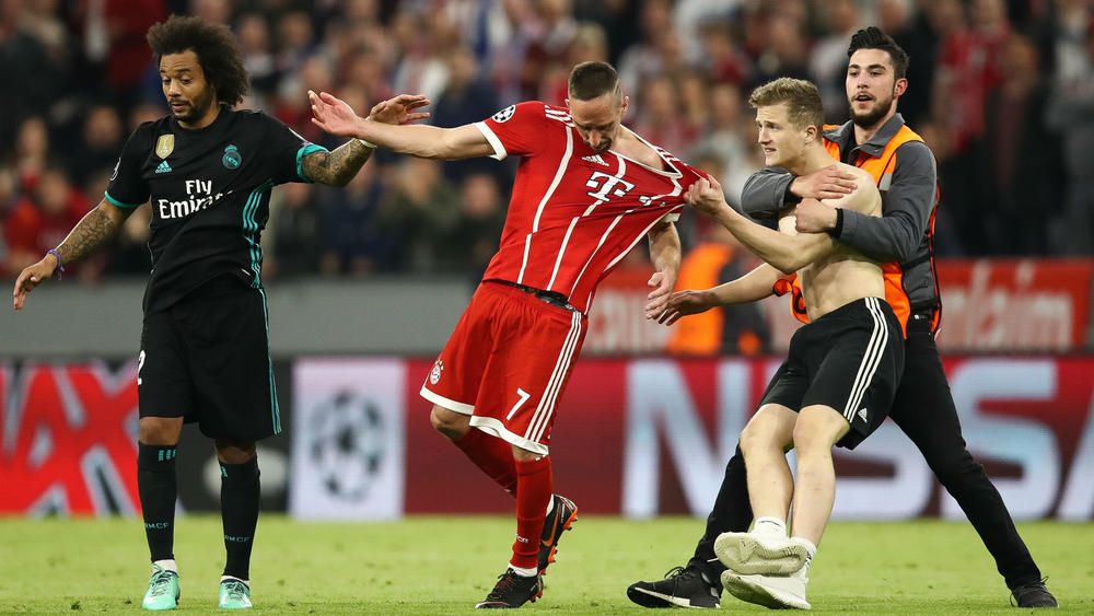 UEFA charges Bayern Munich over pitch invasion and banner | FourFourTwo