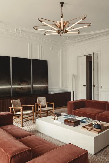 These rust living rooms have convinced me it's the color trend of 2023 ...