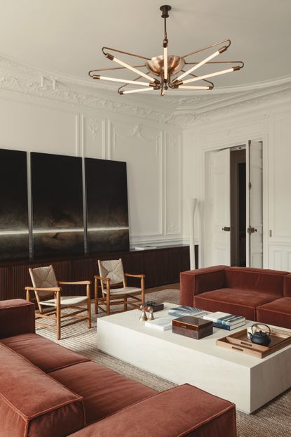 These rust living rooms have convinced me it's the color trend of 2023 ...