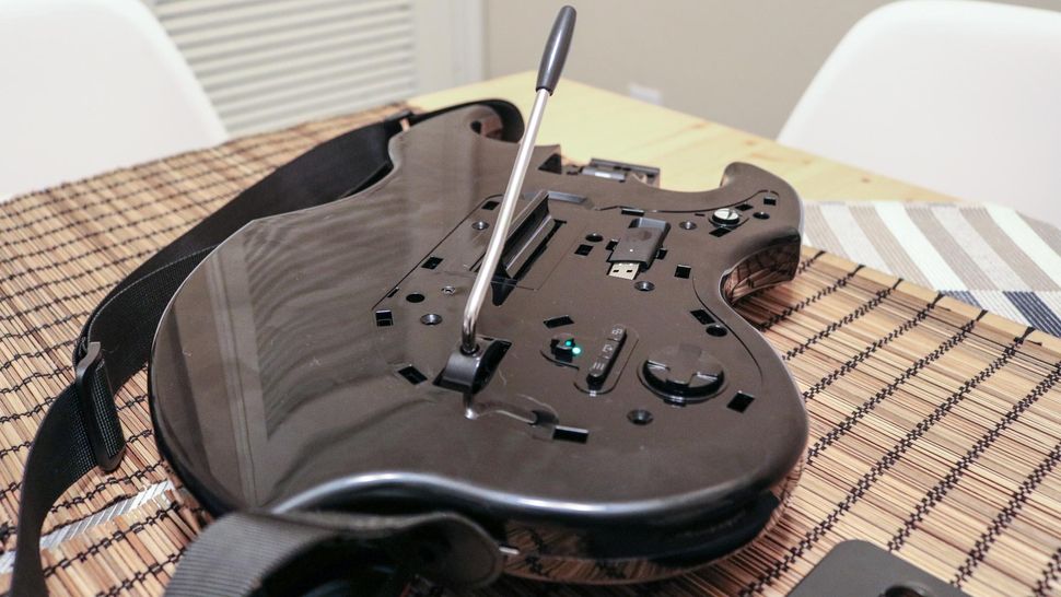 I just tried this new guitar controller — and it's perfect for reliving ...