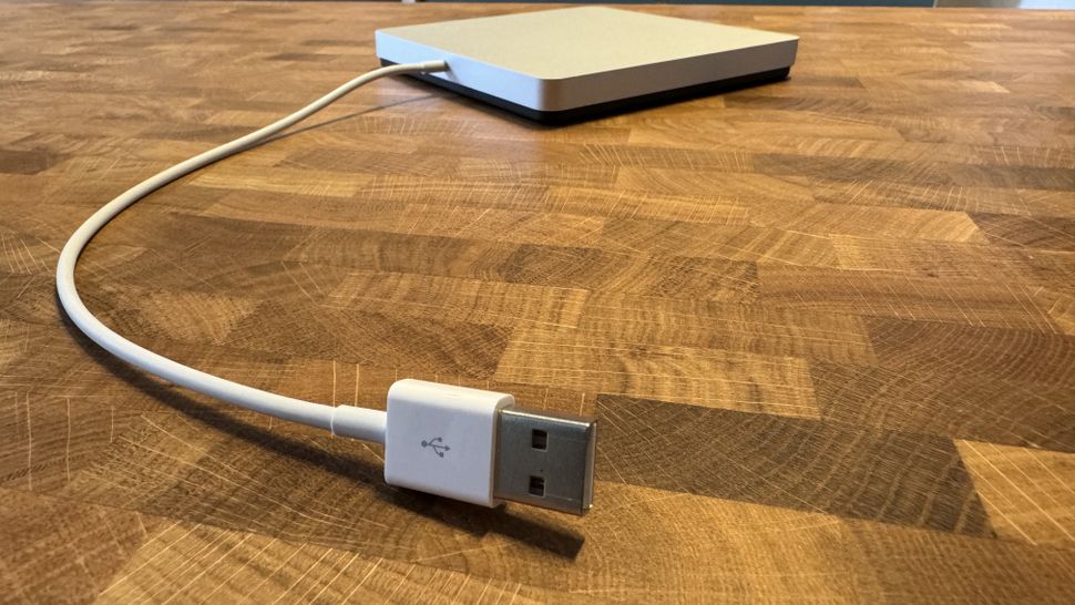 Apple SuperDrive review: A CD/DVD drive "Designed by Apple in ...