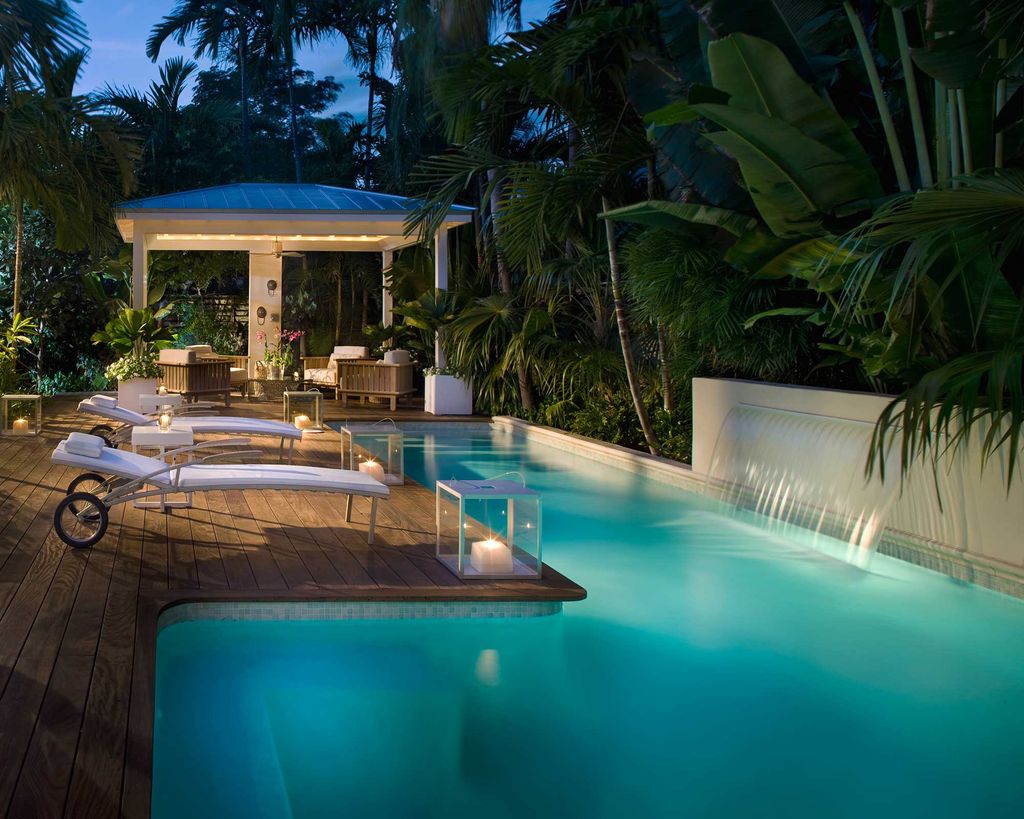 Pool waterfall ideas: 10 looks to elevate your swimming pool | Gardeningetc