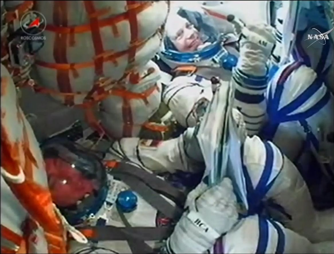 Russian Rocket Launches International Crew of 3 Toward Space Station ...