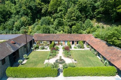 A quintessentially English farmhouse with exquisite gardens, an ...