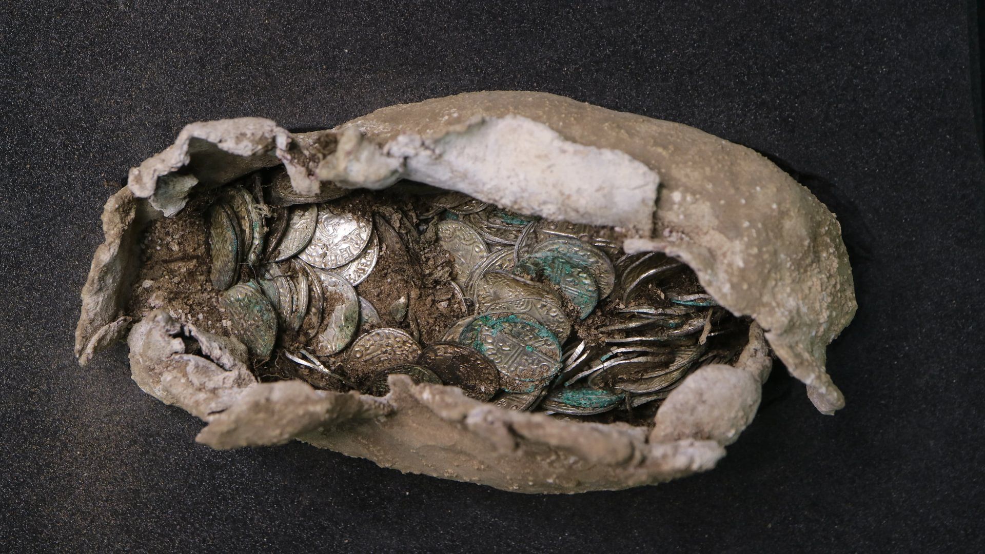 'I was shaking when I first unearthed it': 11th-century silver coin ...