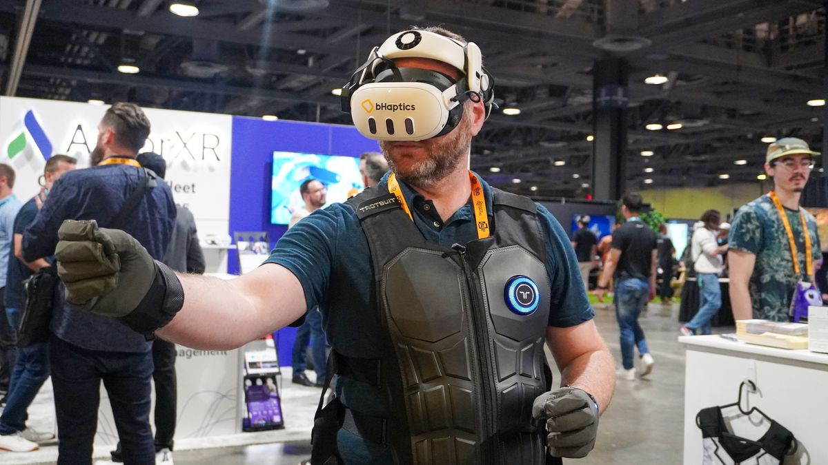 I tested the most advanced haptic VR vest and gloves — it made petting ...