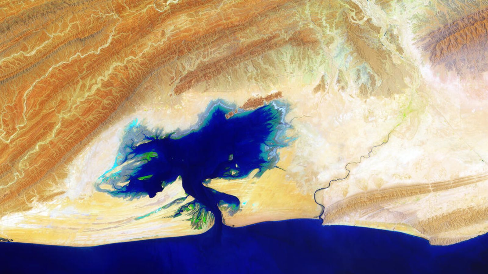 Earth from space: Pakistan's 'bleeding ink' lagoon brings life to harsh ...