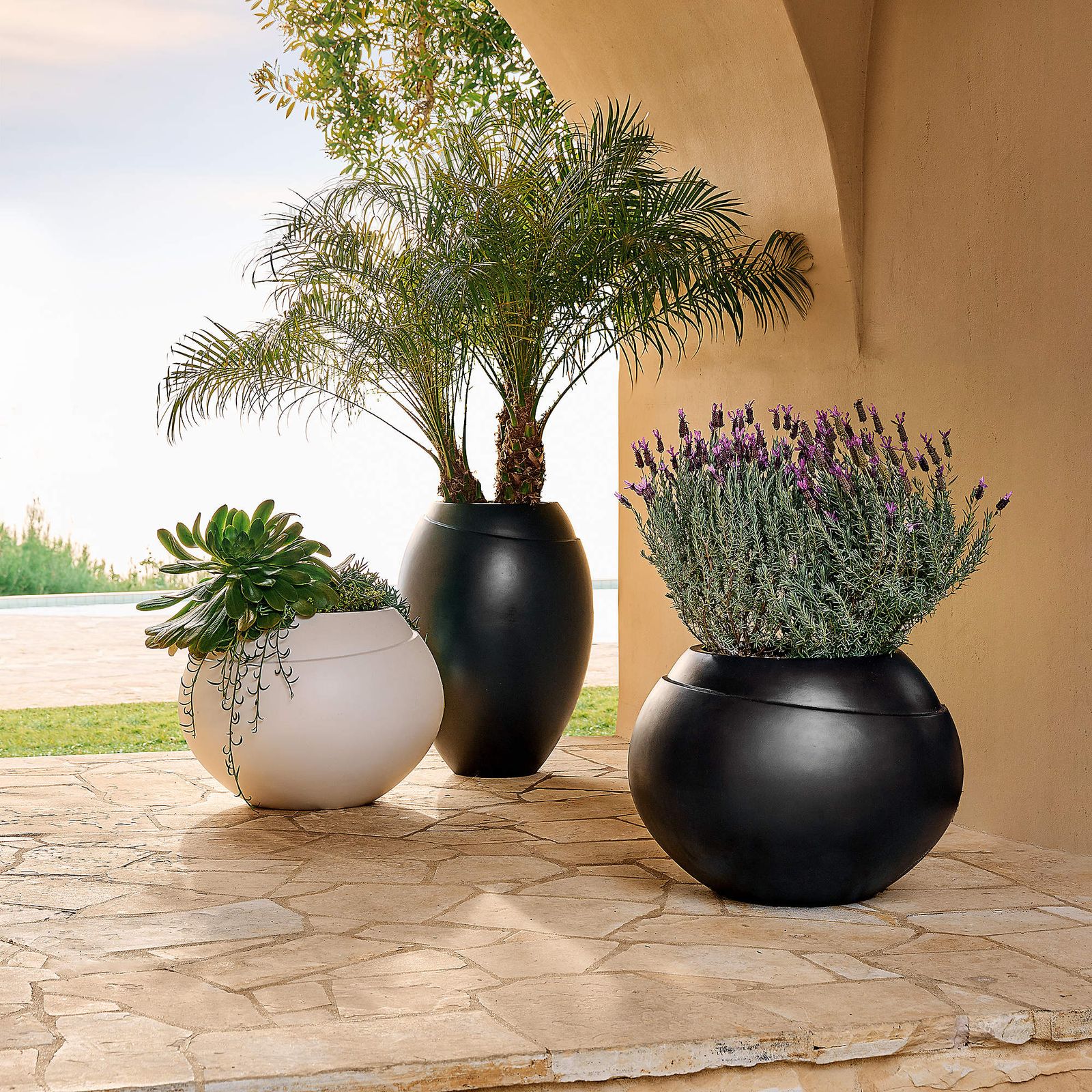 How to style with large decorative pots in the front yard | Homes and ...