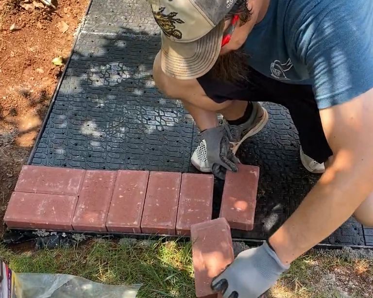 How to lay a brick patio in 10 easy steps | Real Homes