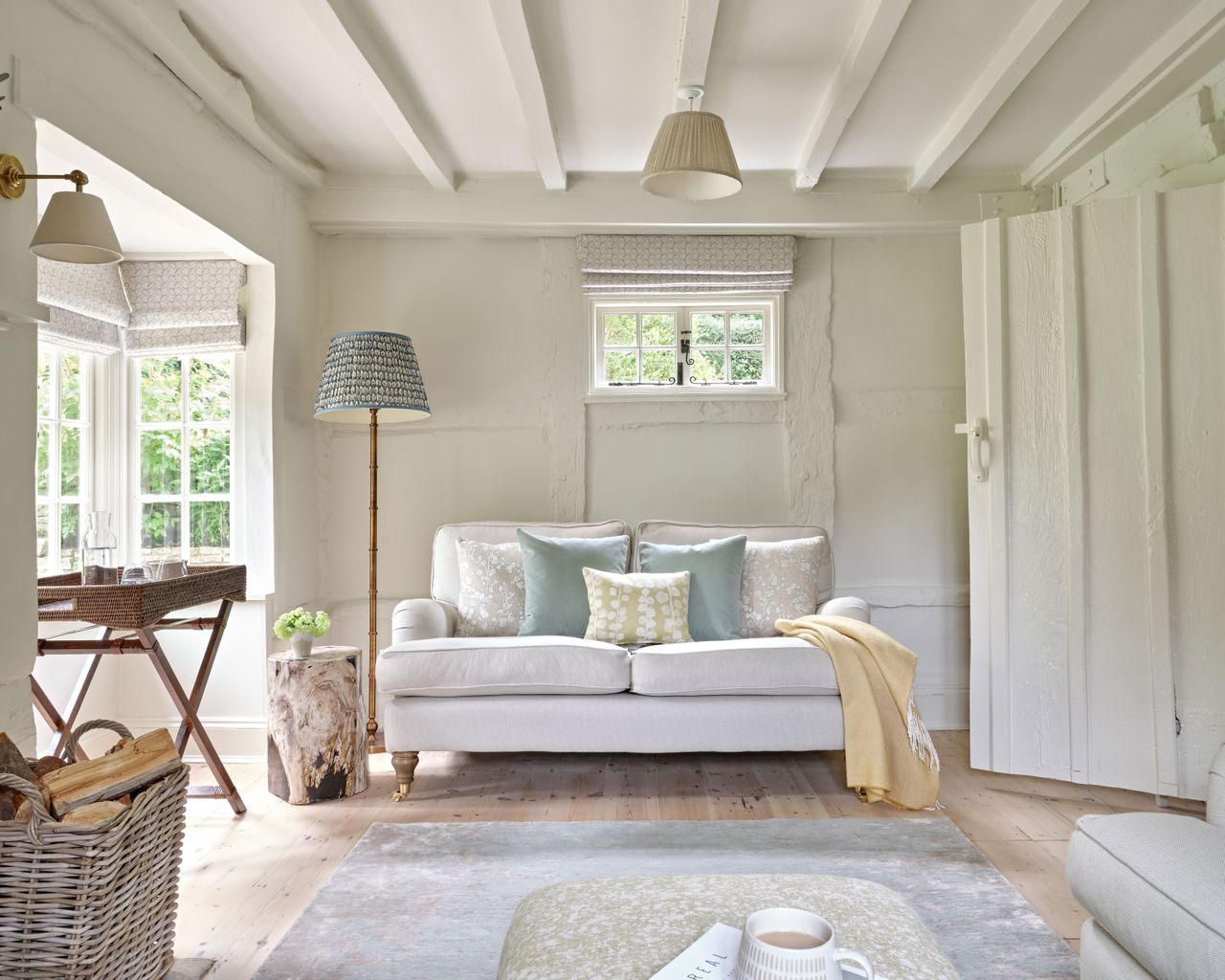 A fairy-tale thatched cottage updated with a light and tranquil ...