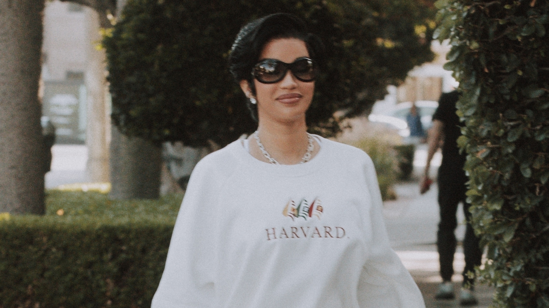 Cardi B Channels Princess Diana in a Harvard Sweatshirt and Shorts ...