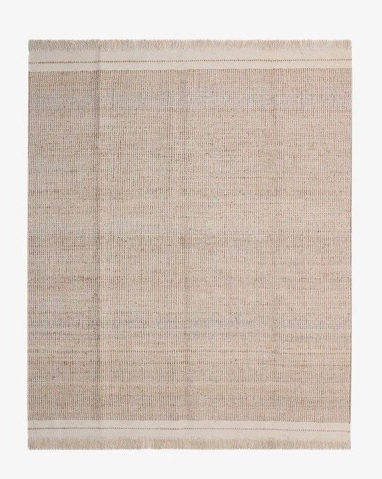 Shea McGee loves this rug hack to elevate the living room | Homes and ...