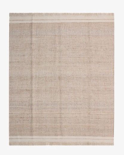 Shea McGee loves this rug hack to elevate the living room | Homes and ...