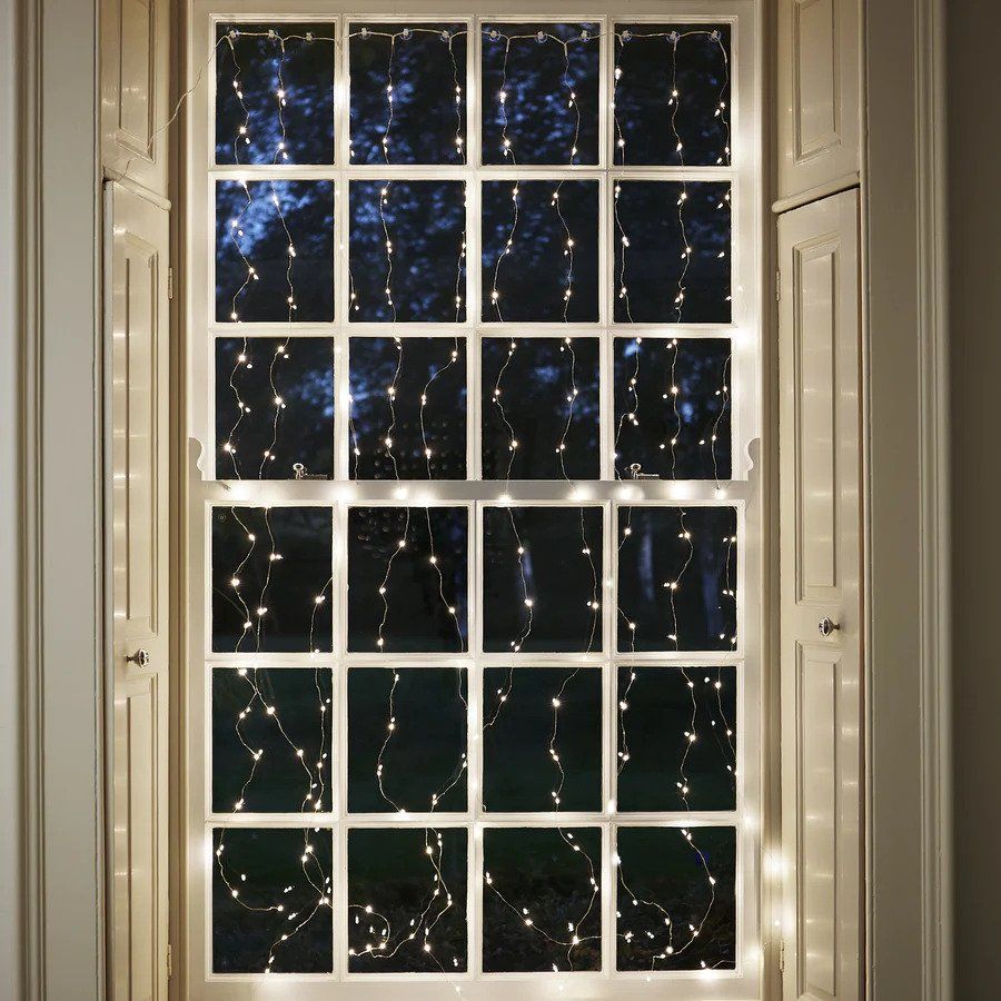 How to hang Christmas lights around windows without nails | Ideal Home