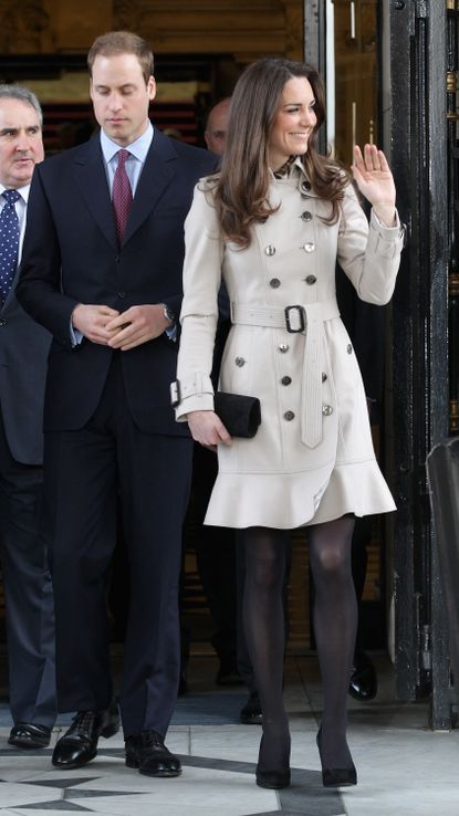 Kate Middleton's short Burberry trench coat with sheer black tights and ...