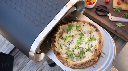 The Revolve Pizza Oven is perfectly portable, and will cook pizza in ...