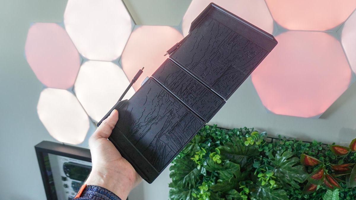 This tri-screen portable monitor setup has revolutionized my ...