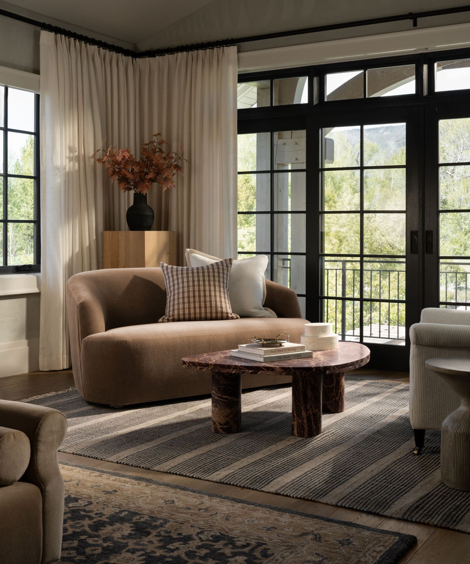 How do you combine two rugs in one room? Shea Mcgee has the formula ...