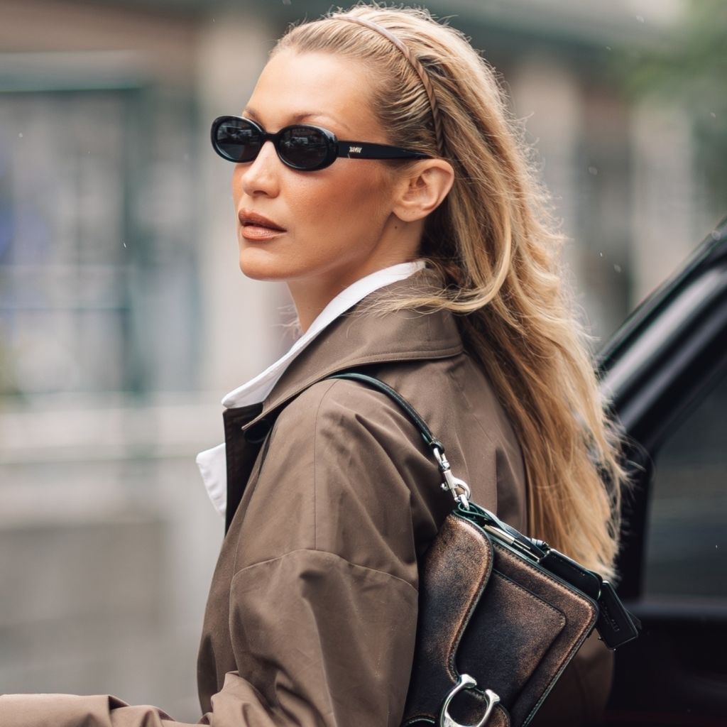 Gigi Hadid Wraps Herself in a DHL Tape Mini Dress for Vetements's Paris ...